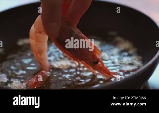 Garlic chilli prawns Stock Videos & Footage - HD and 4K Video Clips - Alamy