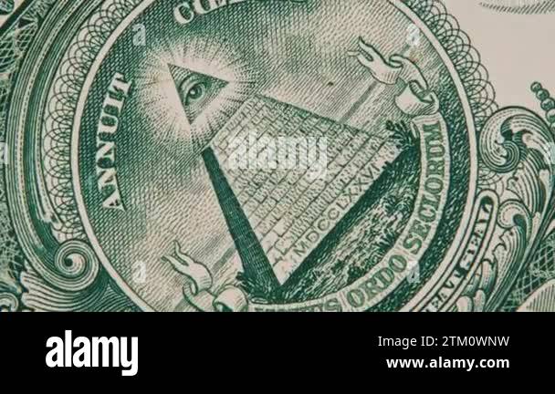 Mason sign symbol of the all-seeing eye sign rotates on a one dollar ...