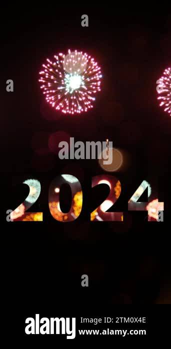 4K vertical. loop seamless of firework of year 2024 greeting during new ...