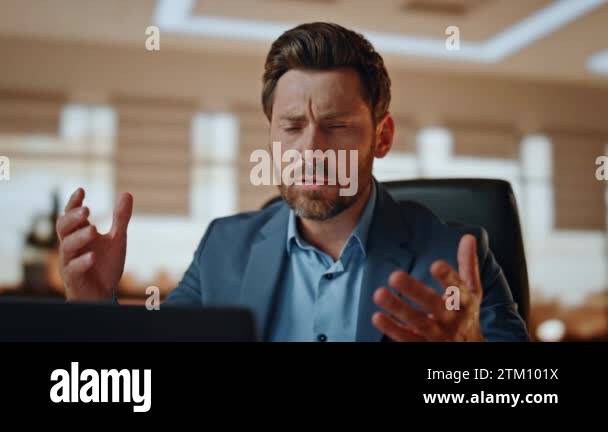Shocked man arguing laptop workplace closeup. Nervous stressed ...