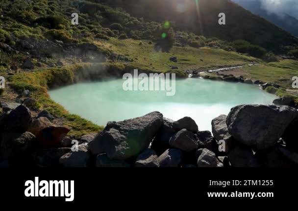 pool at a sulfuric spy spring at old abandoned ruins of Hotel at the ...