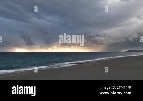 Thunderstorms, bolt, and cloudy storm flow over the sea in morning ...