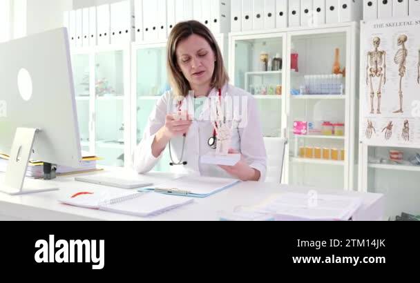 Human hand or wrist bone skeletal model doctor explains bone problem ...