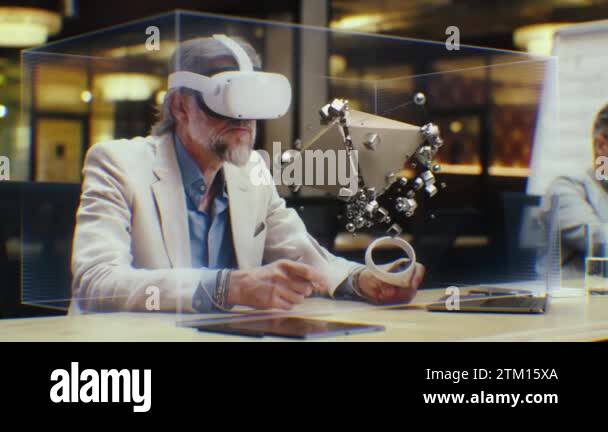 Male designer uses VR headset and wireless controllers, creates ...