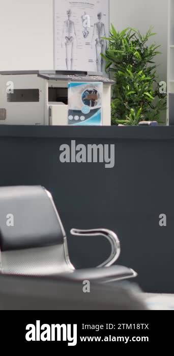 Vertical video: Hospital waiting room in medical center, empty ...