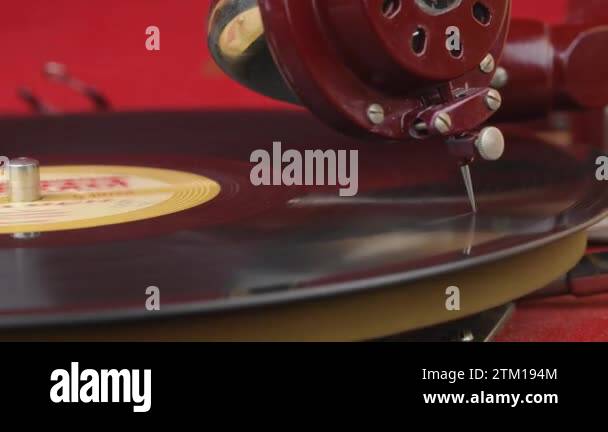 A phonograph to play classical music on shellac vinyl. Listening to ...