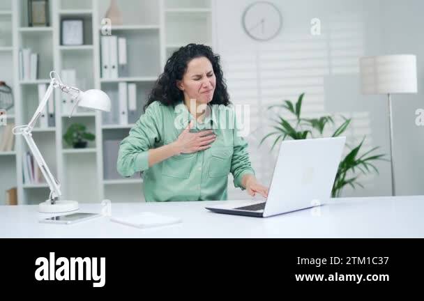 Female has a heart attack pain, tension Sick employee feeling heartache ...