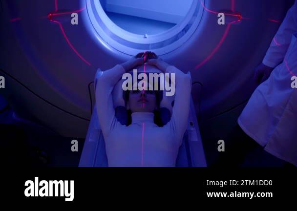 4k video CT scan of abdomen of woman in medical clinic. Girl patient is ...