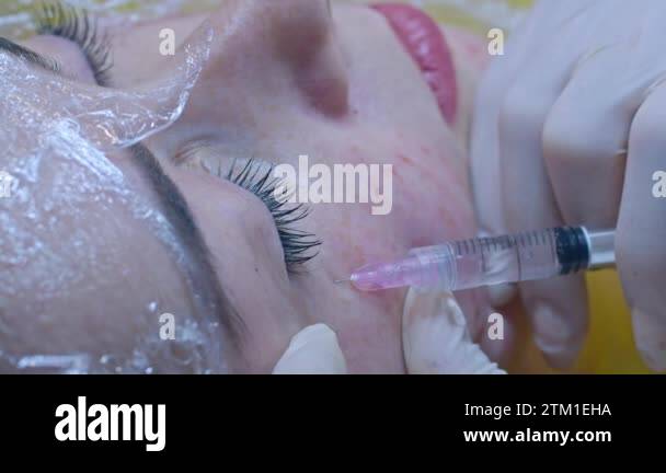 Beauty and injection concept. Cosmetology in the clinic. An experienced ...