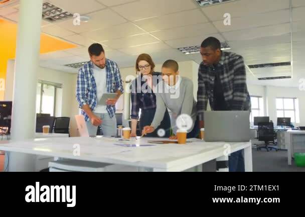 Animation of connected music and phone icons over diverse colleagues ...