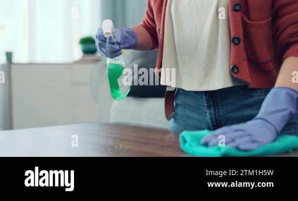 Spray, hands and woman cleaning table, furniture surface and ...