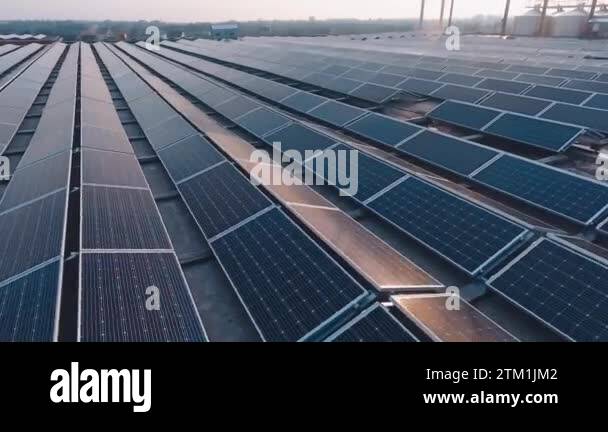 Sunny reflection on solar cells at sunset. Innovative solar farm with ...