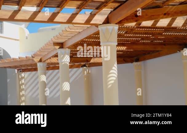Pergola supported by brick columns in background Stock Videos & Footage ...