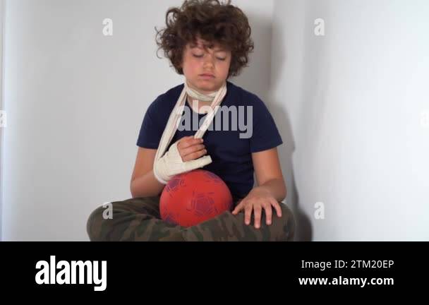 boy child 8 years old child breaks by fracturing the finger of his ...