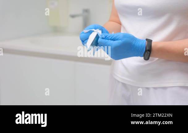 dentist unpacks sterile dental instruments Nurse hands unpacking piezo ...