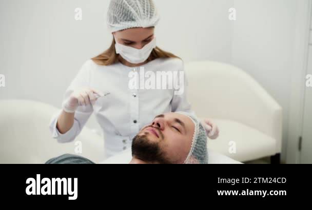 Man face injection Stock Videos & Footage - HD and 4K Video Clips - Alamy