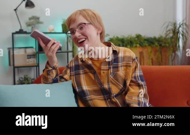 Portrait of young woman making phone call conversation with friend ...