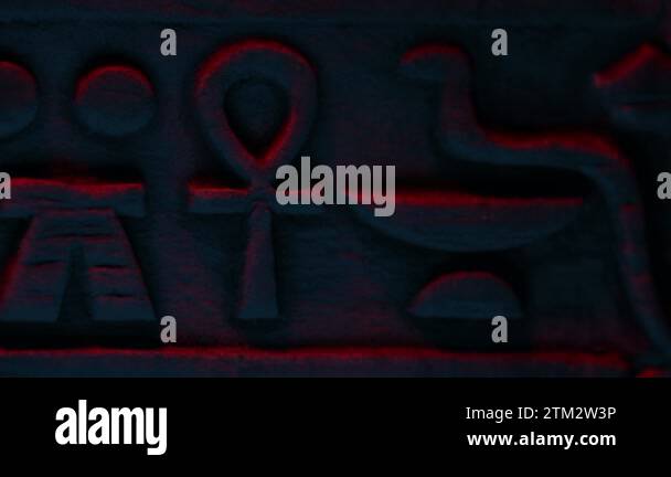 Ankh And Snake Symbols Are Lit Up On Old Wall Stock Video Footage - Alamy