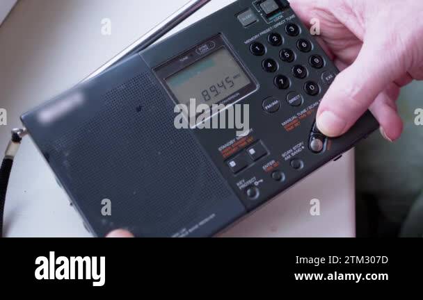 Finding a Frequency on a Black Dusty Modern Portable Digital Radio ...