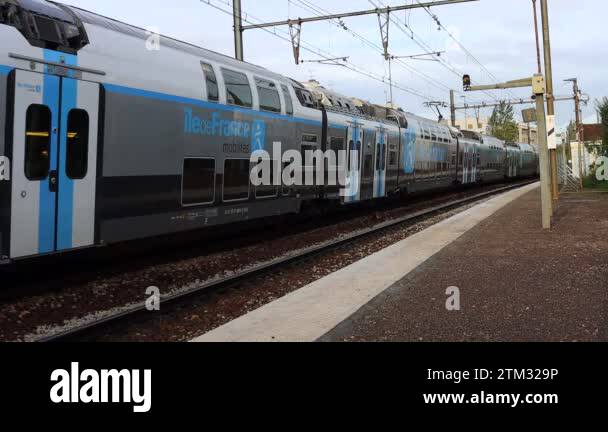 Ile de France, France November 9, 2023: SNCF Double-Decker Train Departing from the Station ...
