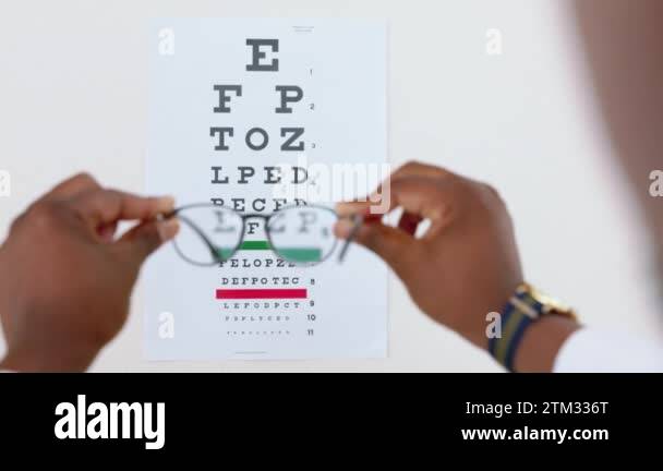 Optometry, letter and healthcare with glasses and chart and doctor for ...
