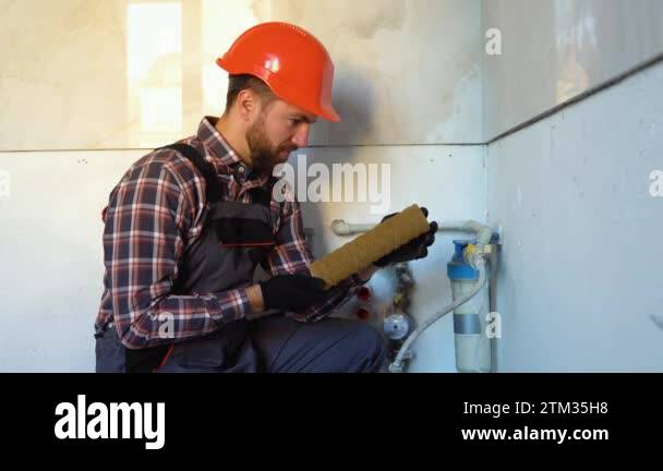 Plumber filter Stock Videos & Footage - HD and 4K Video Clips - Alamy