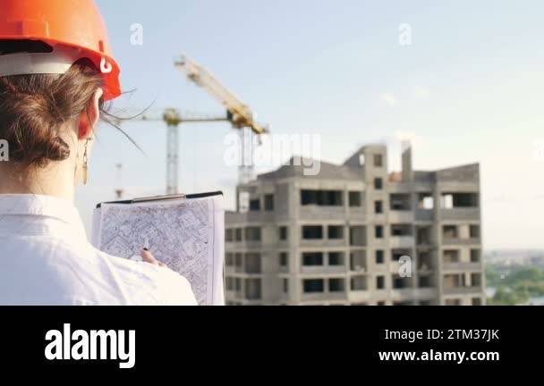Architect looking on project on construction site Stock Video Footage ...