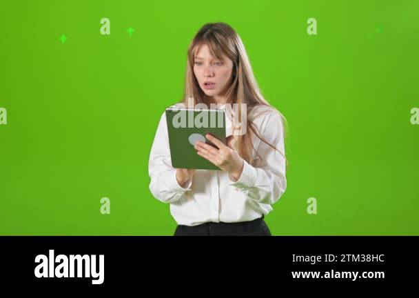 Front view of surprised, blonde female standing, looking at camera ...