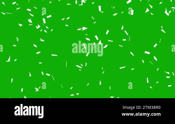 Falling white confetti particles motion graphics with green screen ...