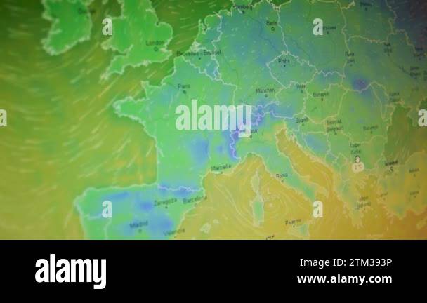 Temperature and wind map Europe shot of a computer screen. Moving ...