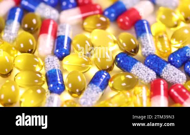 Background with colorful capsules Stock Video Footage - Alamy