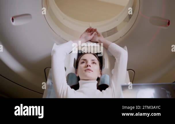 4k video CT scanning of abdomen of woman in medical clinic. Girl ...