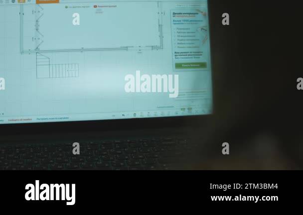 Architect sketching a home design architecture project on a computer ...