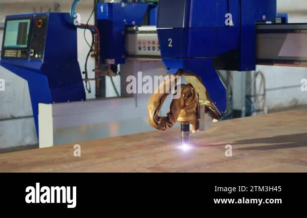 Laser burn modern technology in the manufacturing factory using the hot ...
