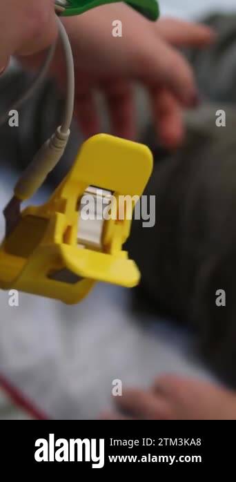 cardiogram in the hospital woman doctor examines a man patient puts ...