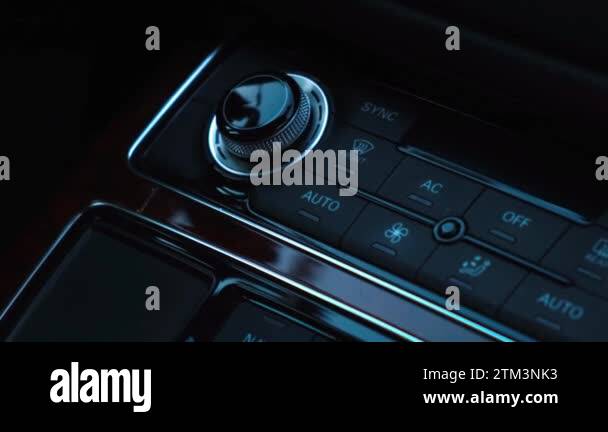 Interior of modern luxury car. Details of multimedia menu control ...
