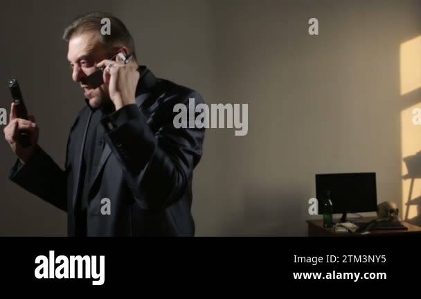 Telephone gun Stock Videos & Footage - HD and 4K Video Clips - Alamy