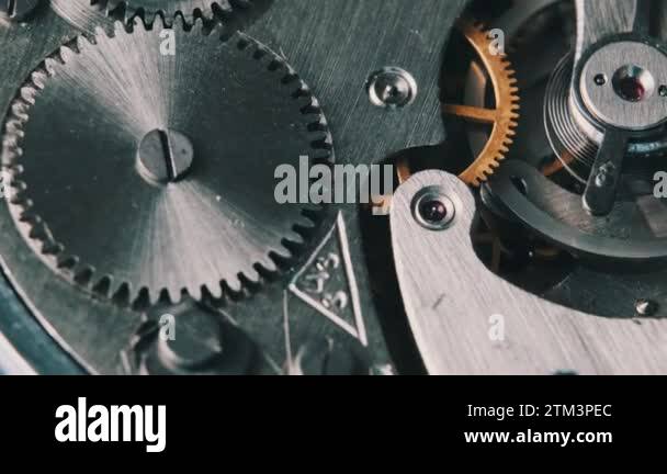 Clock mechanism rotates close-up. The working mechanism of round ...