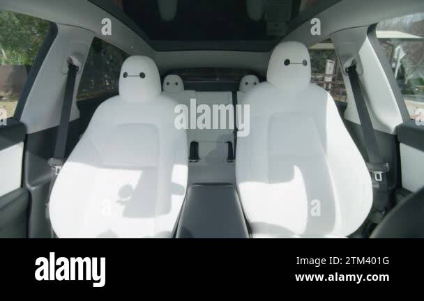 Empty Tesla Model Y car self driving using autopilot technology on ...