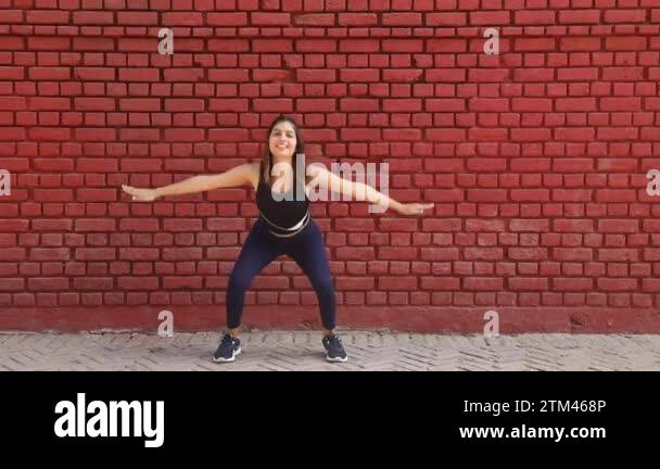 Squat exercise wall Stock Videos & Footage - HD and 4K Video Clips - Alamy