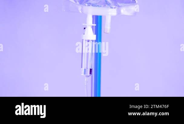 Closeup of IV drip on site of an emergency, Intravenous saline solution ...