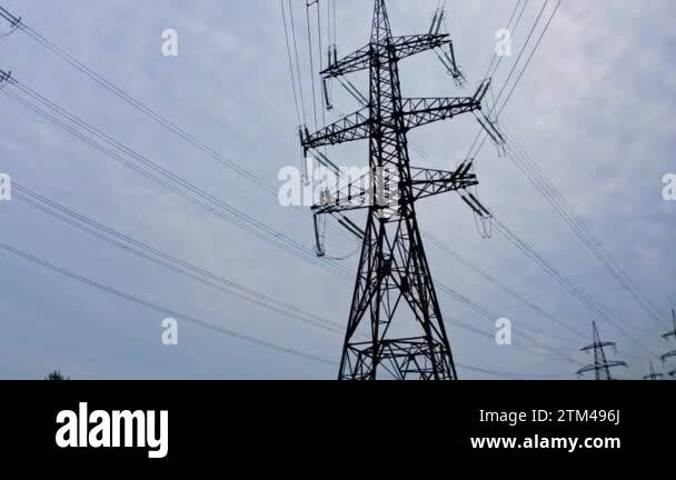 Electricity transmission and distribution towers Stock Videos & Footage ...