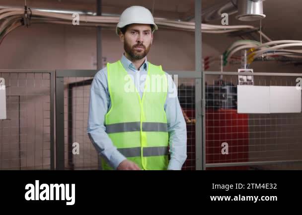Portrait face male engineer technician standing in technical room of ...