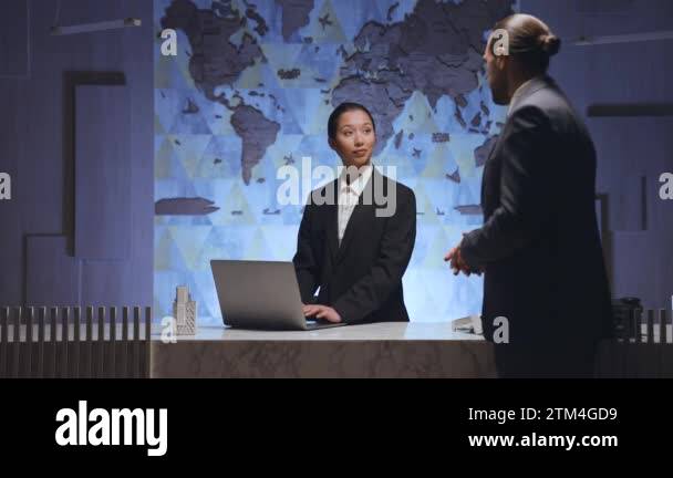 Woman behind office reception desk Stock Videos & Footage - HD and 4K ...