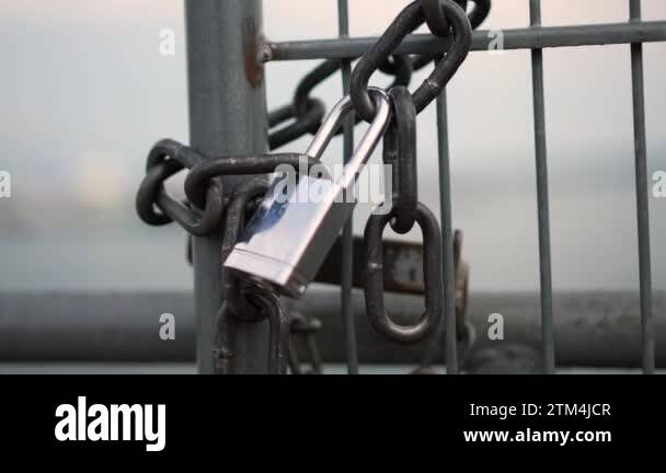 Lock metal gate Stock Videos & Footage - HD and 4K Video Clips - Alamy