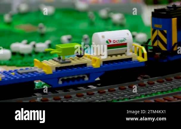 a city completely made of Lego blocks houses cars streets trains trams ...