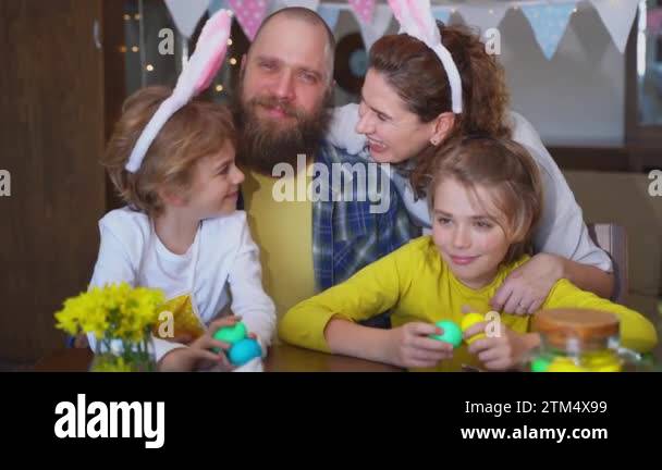 Easter Sunday Family traditions. Parents mom and dad two caucasian ...