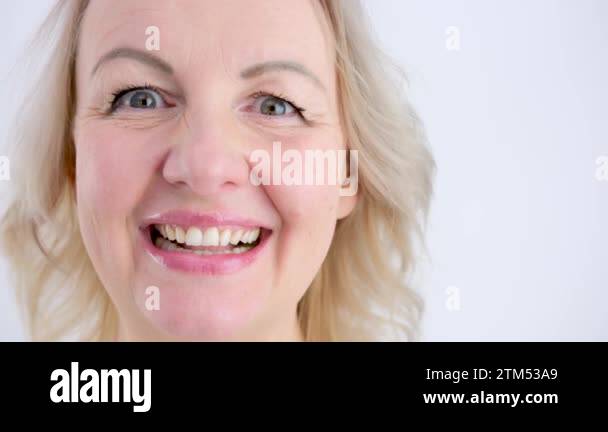 turn your eyes to right to left several times raise eyebrows woman ...