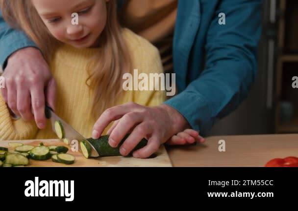 Loving Father Teach Daughter Girl Cook Holding Knife Cutting Fresh