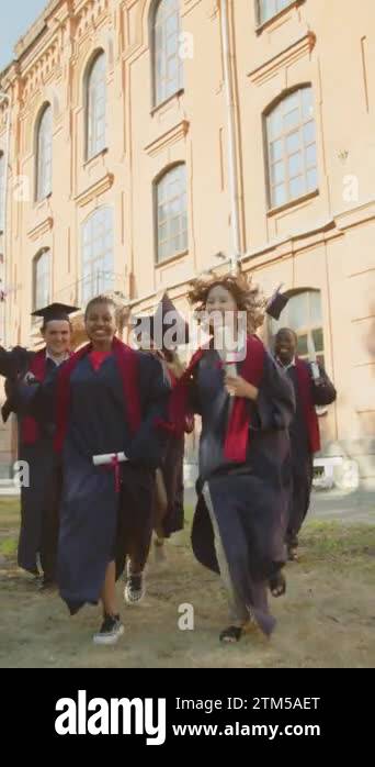 Cheerful students celebrating graduation ceremony Stock Videos ...